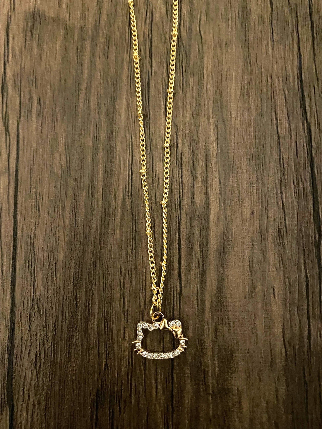 White Rhinestone Hello Kitty Charm Necklace – saritabastone